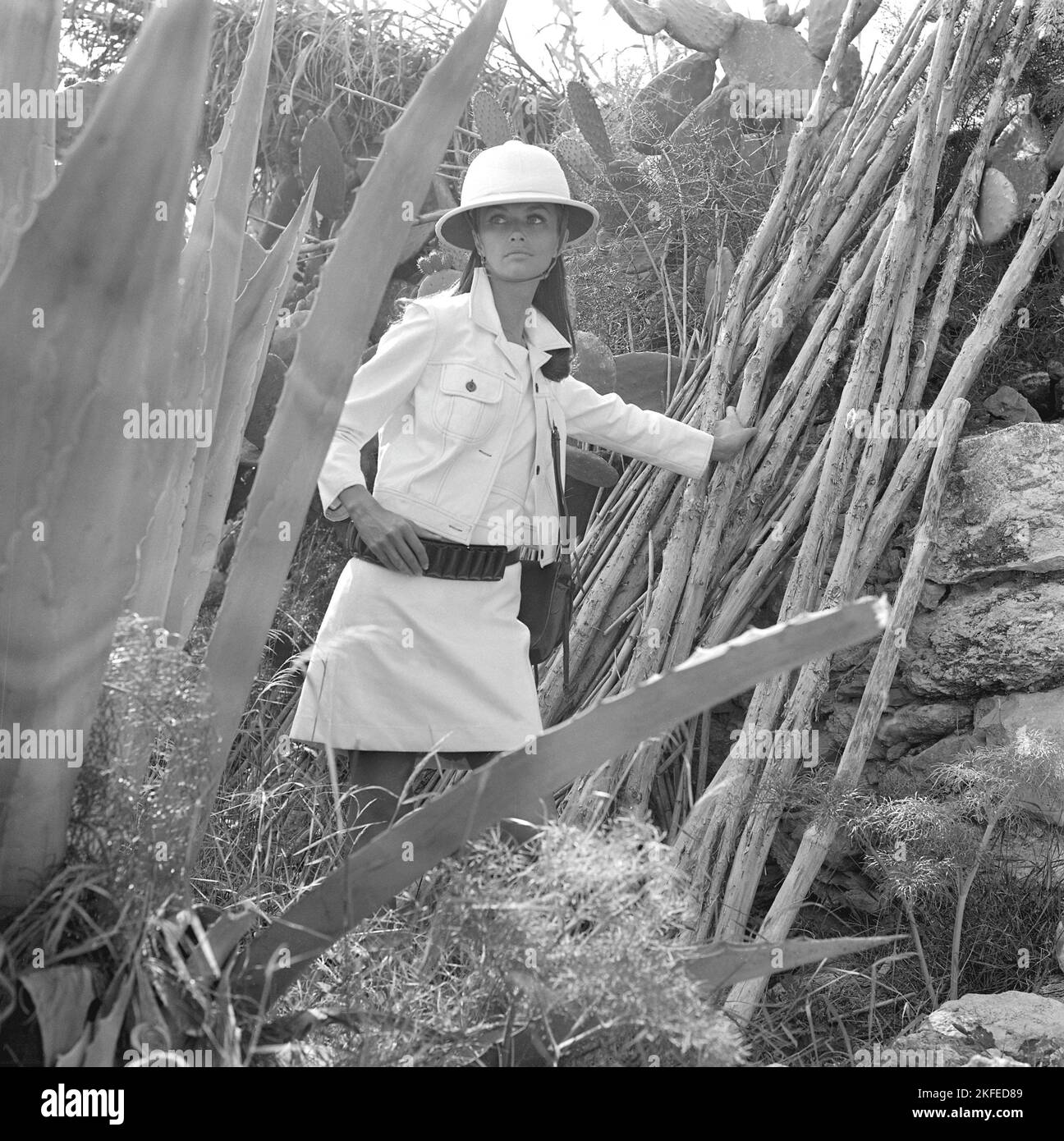 Fashion shoot on the spanish island Ibiza in the 1960s. A fashion model ...
