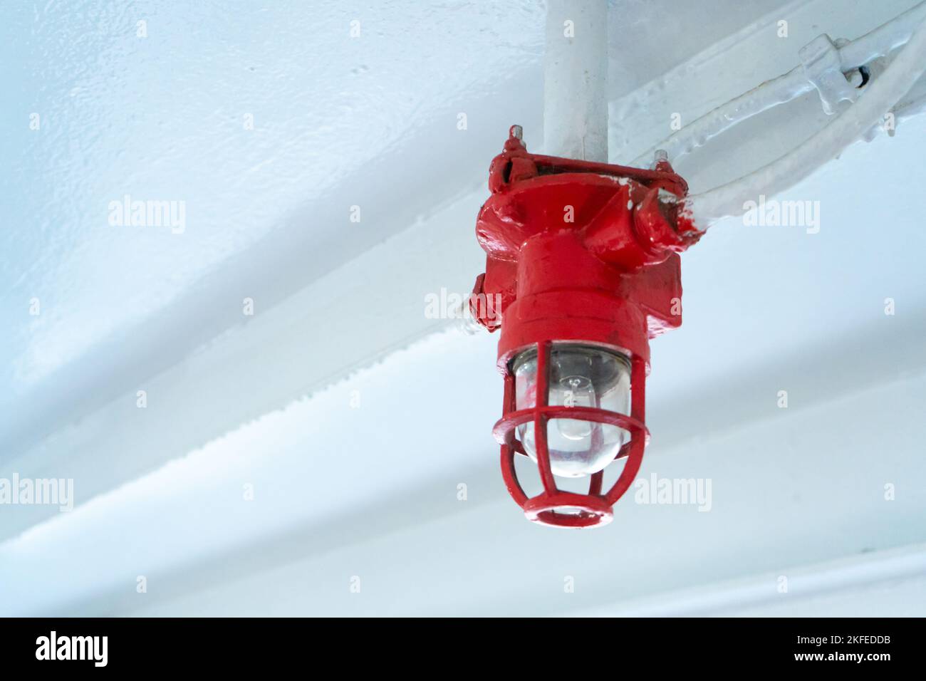 Emergency lighting system. Lamps protected by a grill Stock Photo - Alamy
