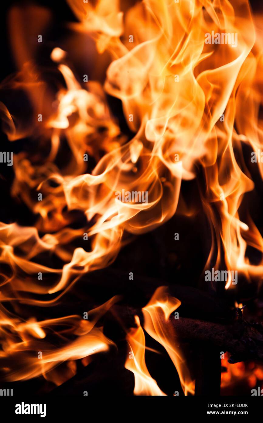 fire burning on a black background. Red fiery flame Stock Photo - Alamy