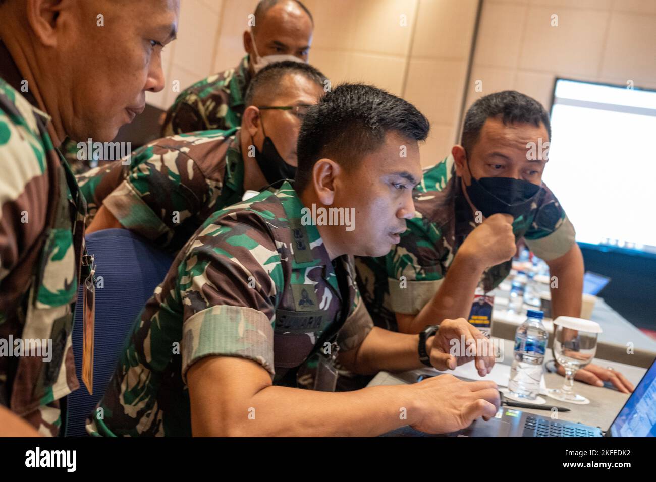 A team of Tentara Nasional Indonesia (TNI, Indonesian Armed Forces ...