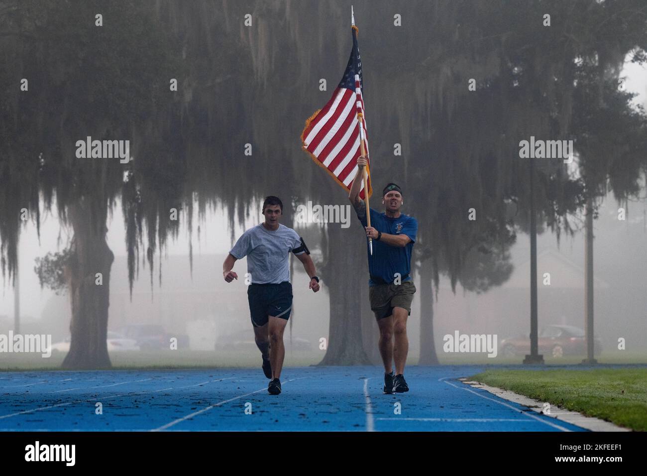 U.S. Air Force Capt. Zachery Butler, left, 23rd Communications Squadron ...
