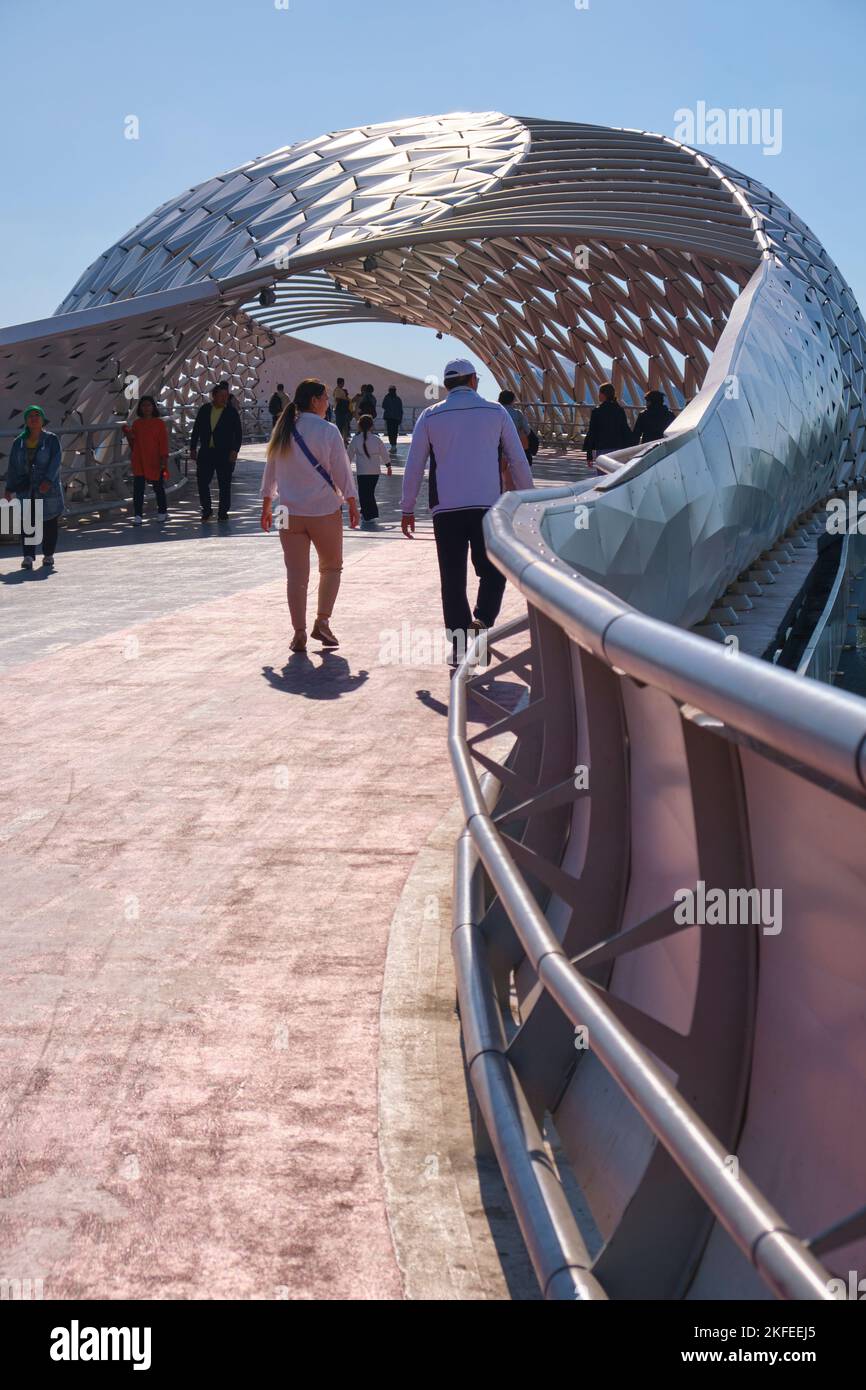 A view of the curvy, open weave, mesh, metal design. At the modern ...