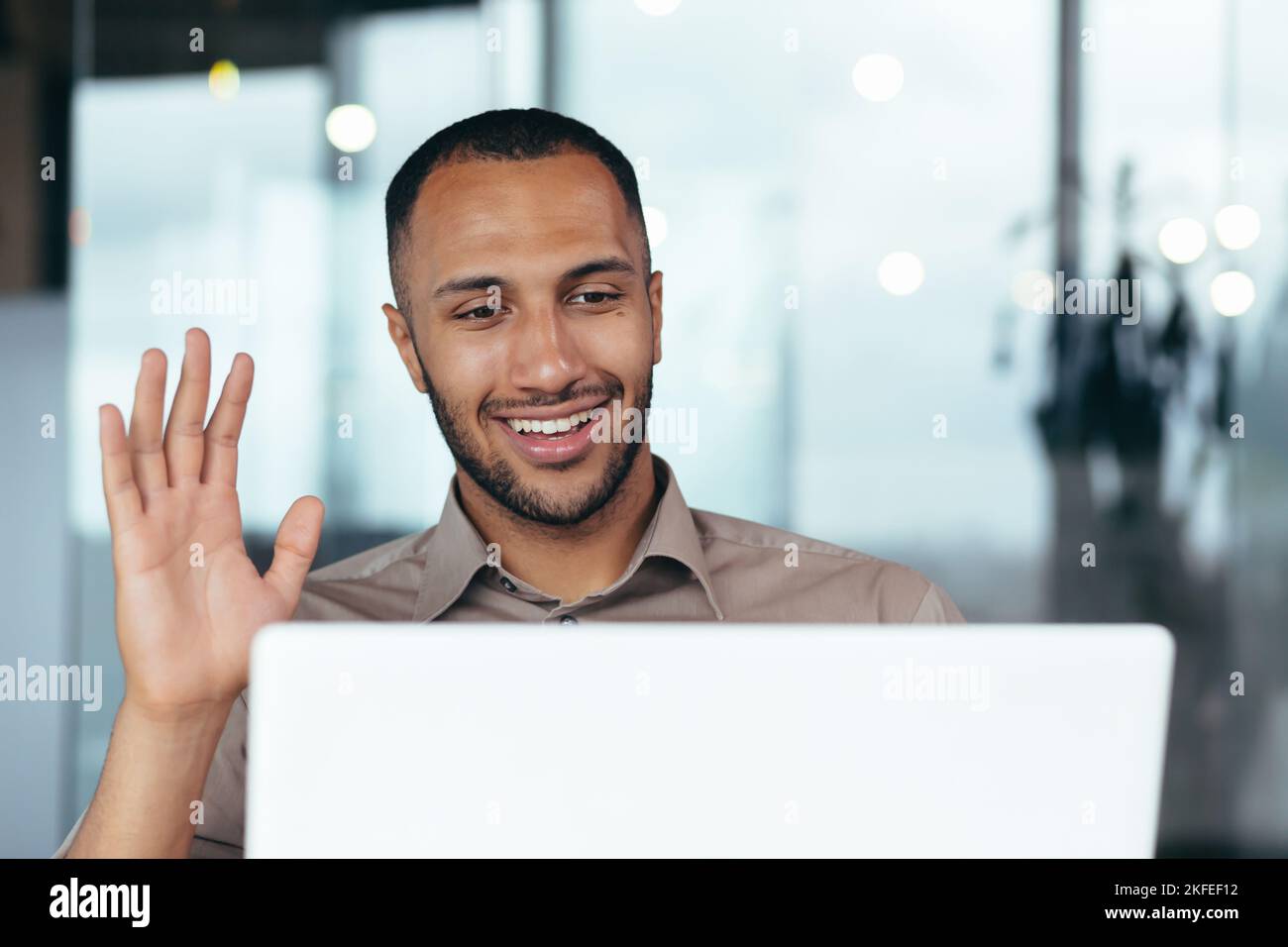 Young businessman communicating on video hi-res stock photography and ...