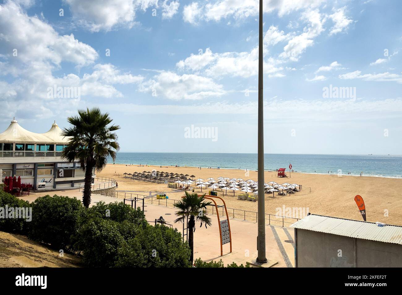 People enjoying their time on the beach in Carcavelos Stock Photo - Alamy