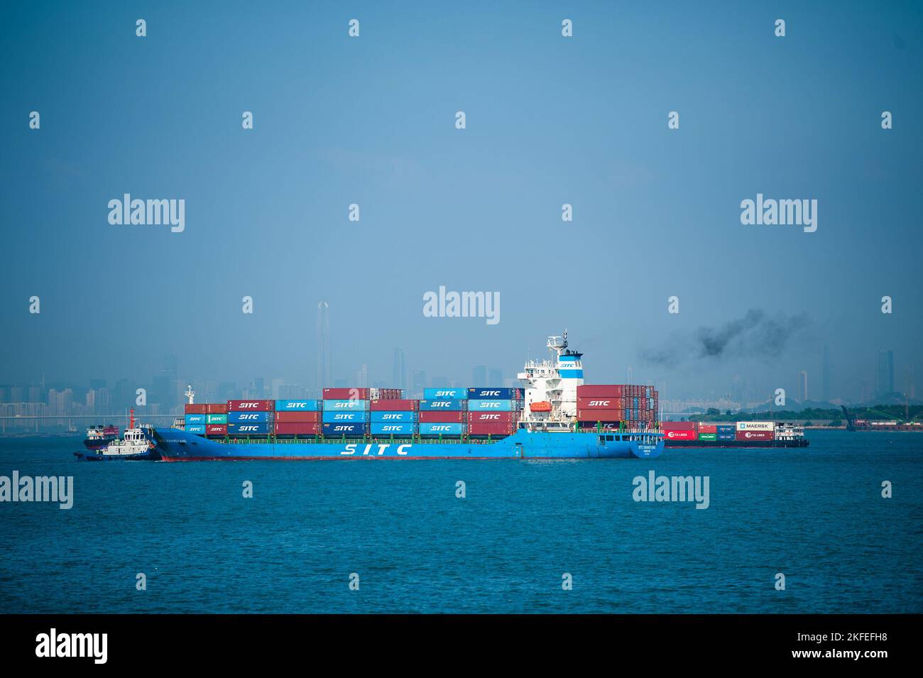 Container ships shuttle over the sea at the Guangdong-Hong Kong-Macao ...