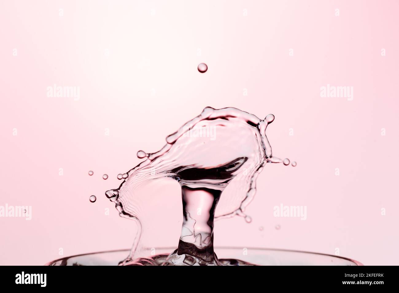 Water Drop with Ripples on water surface Stock Photo - Alamy