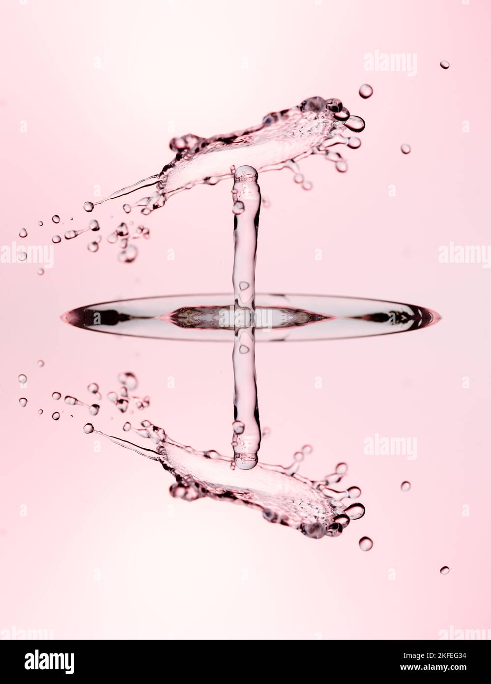 Water Drop with Ripples on water surface Stock Photo - Alamy
