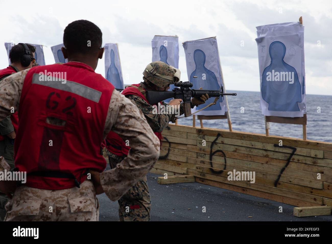 U.S. Marines with 31st Marine Expeditionary Unit conduct a live-fire range aboard Amphibious ...