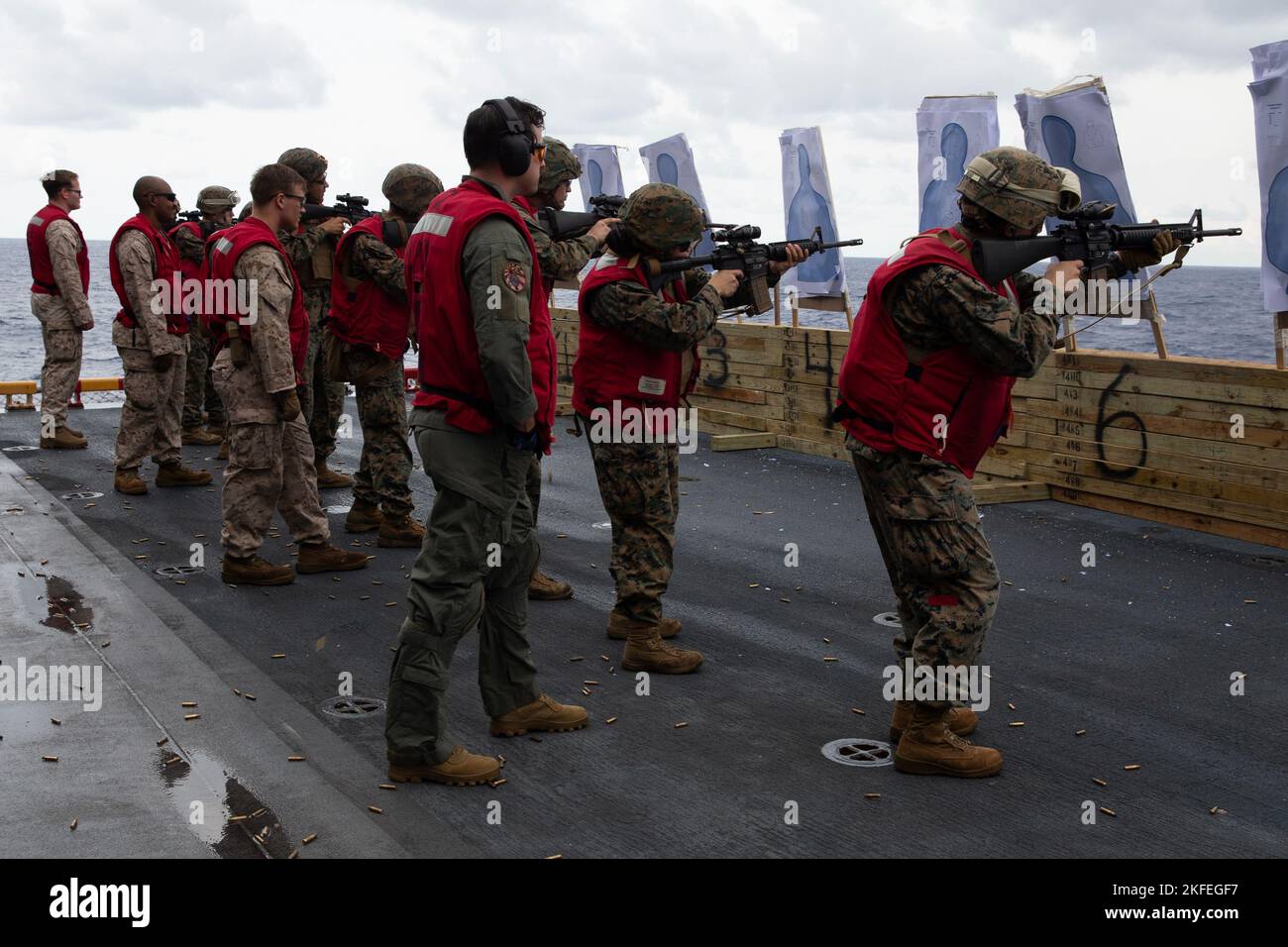 U.S. Marines with 31st Marine Expeditionary Unit conduct a live-fire range aboard Amphibious ...