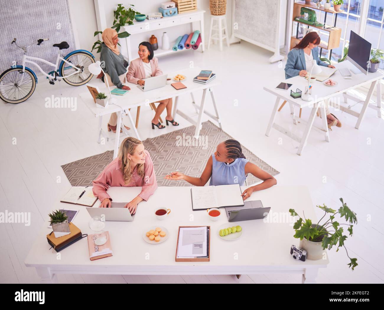Creative, office and aerial of people, working in design studio for ...
