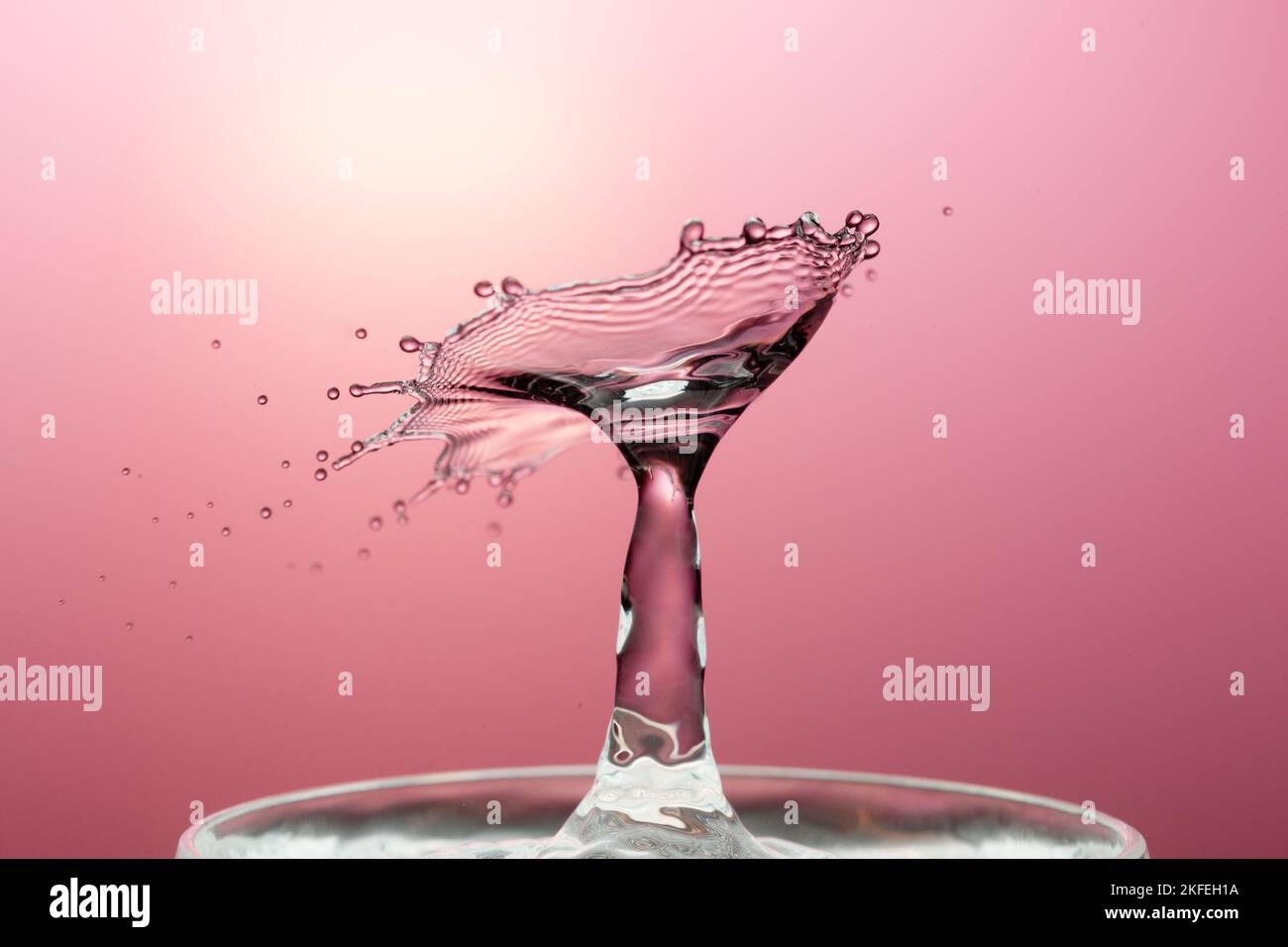 Water Drop with Ripples on water surface Stock Photo - Alamy