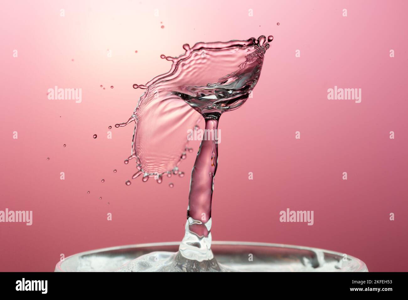 Water Drop with Ripples on water surface Stock Photo - Alamy