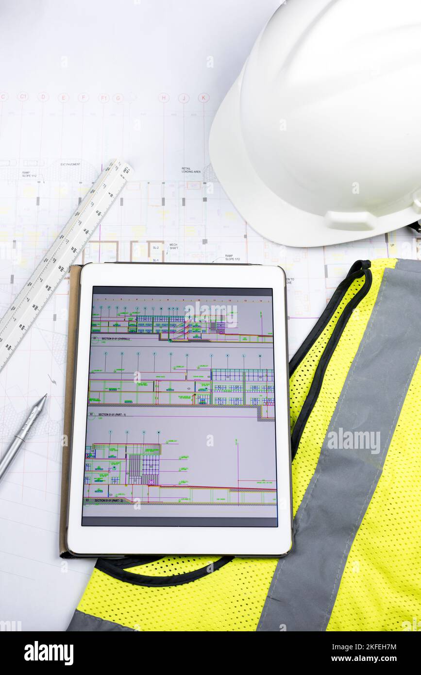 Digital tablet with a drawing on screen, hard copy of drawing ...