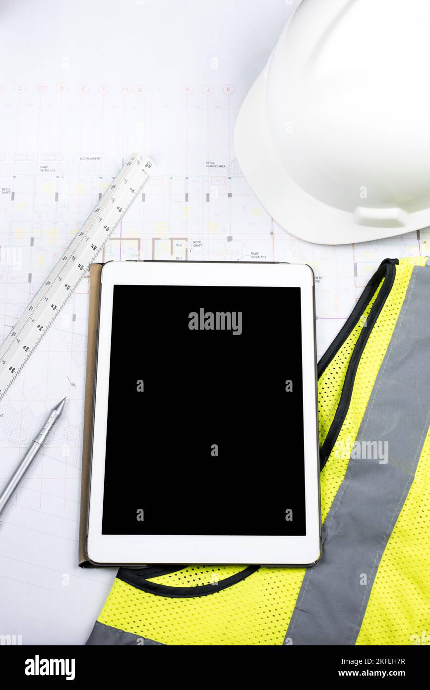 Digital tablet with black screen, hard copy of drawing, triangular ...