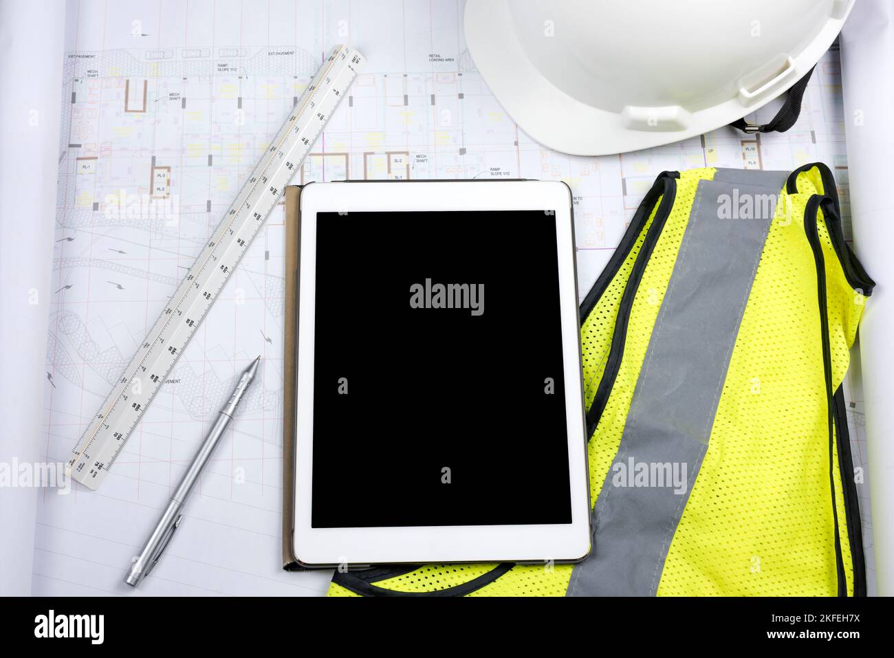 Digital tablet with black screen, hard copy of drawing, triangular ...