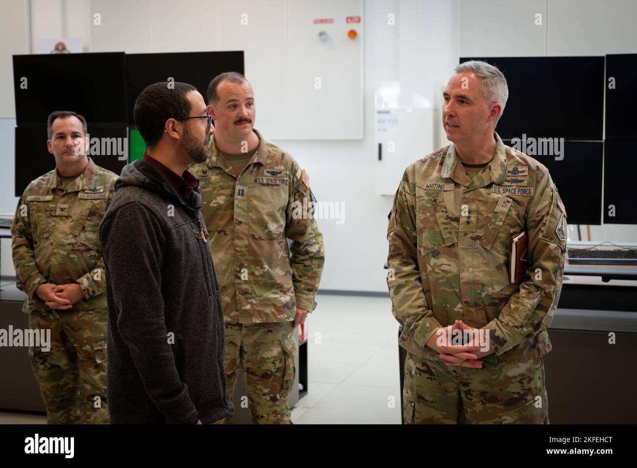 Lt. Gen. Stephen N. Whiting, Space Operations Command commander, greets ...