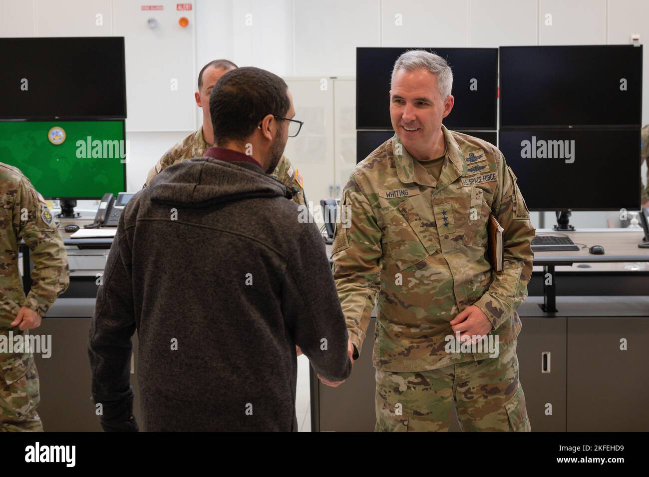 Lt. Gen. Stephen N. Whiting, Space Operations Command commander, greets ...