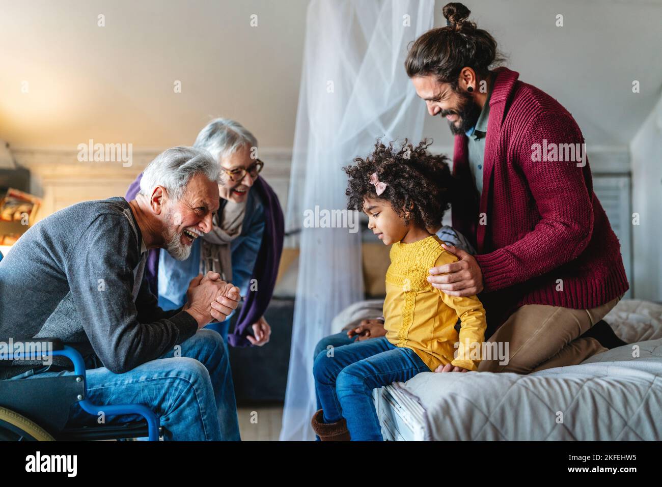 Portrait of multiethnic happy multigeneration family with adopted child ...
