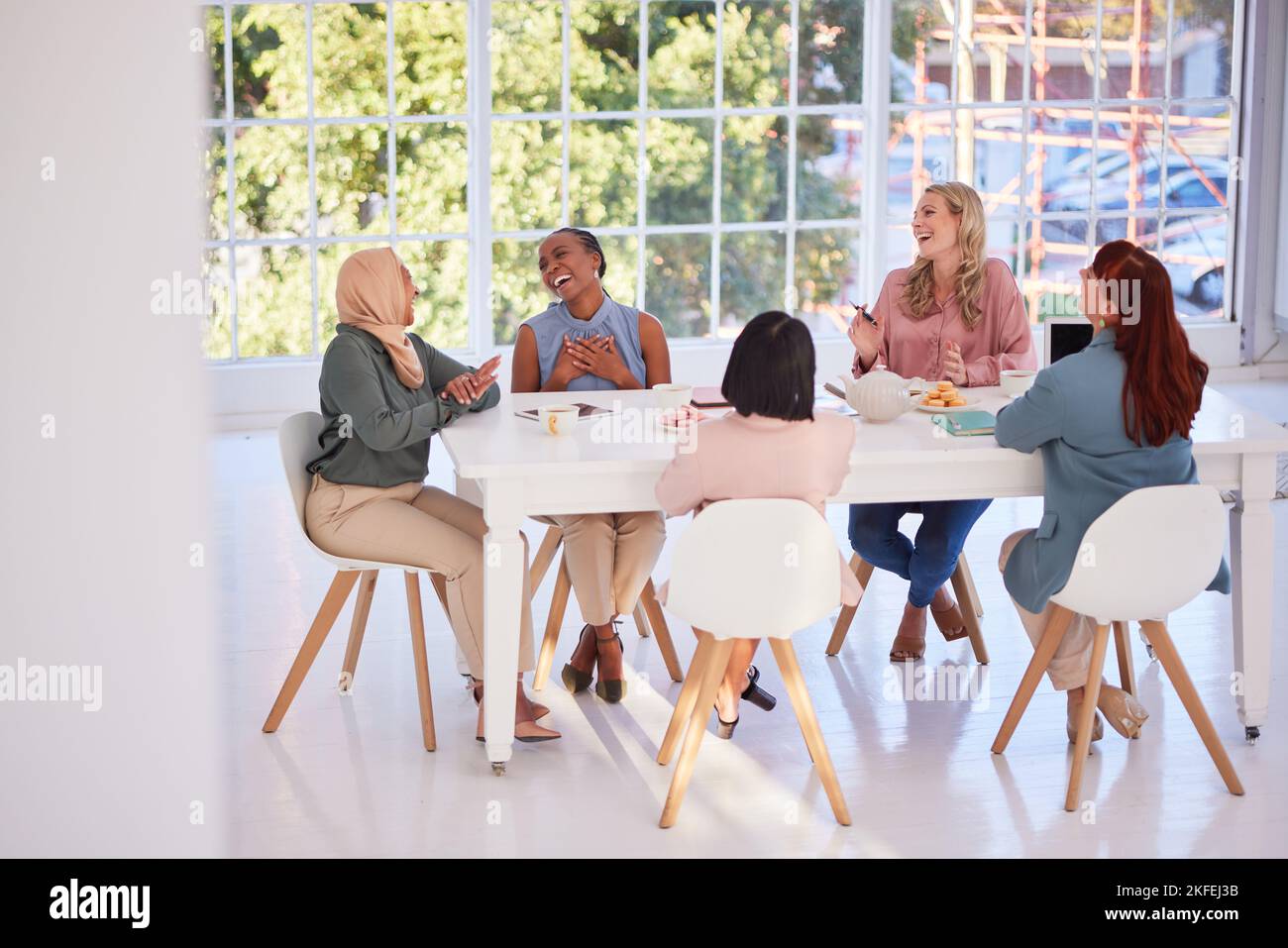 Collaboration, food and team building with a business woman group ...