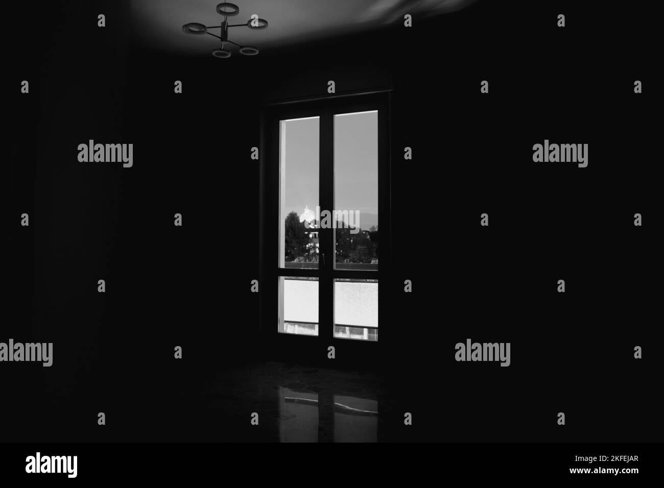 A bright window on the night Stock Photo - Alamy