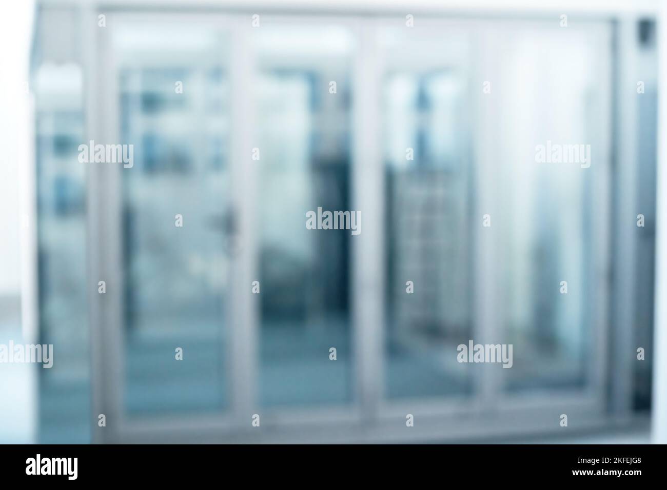 blurry image of glass sliding doors in a private home Stock Photo - Alamy