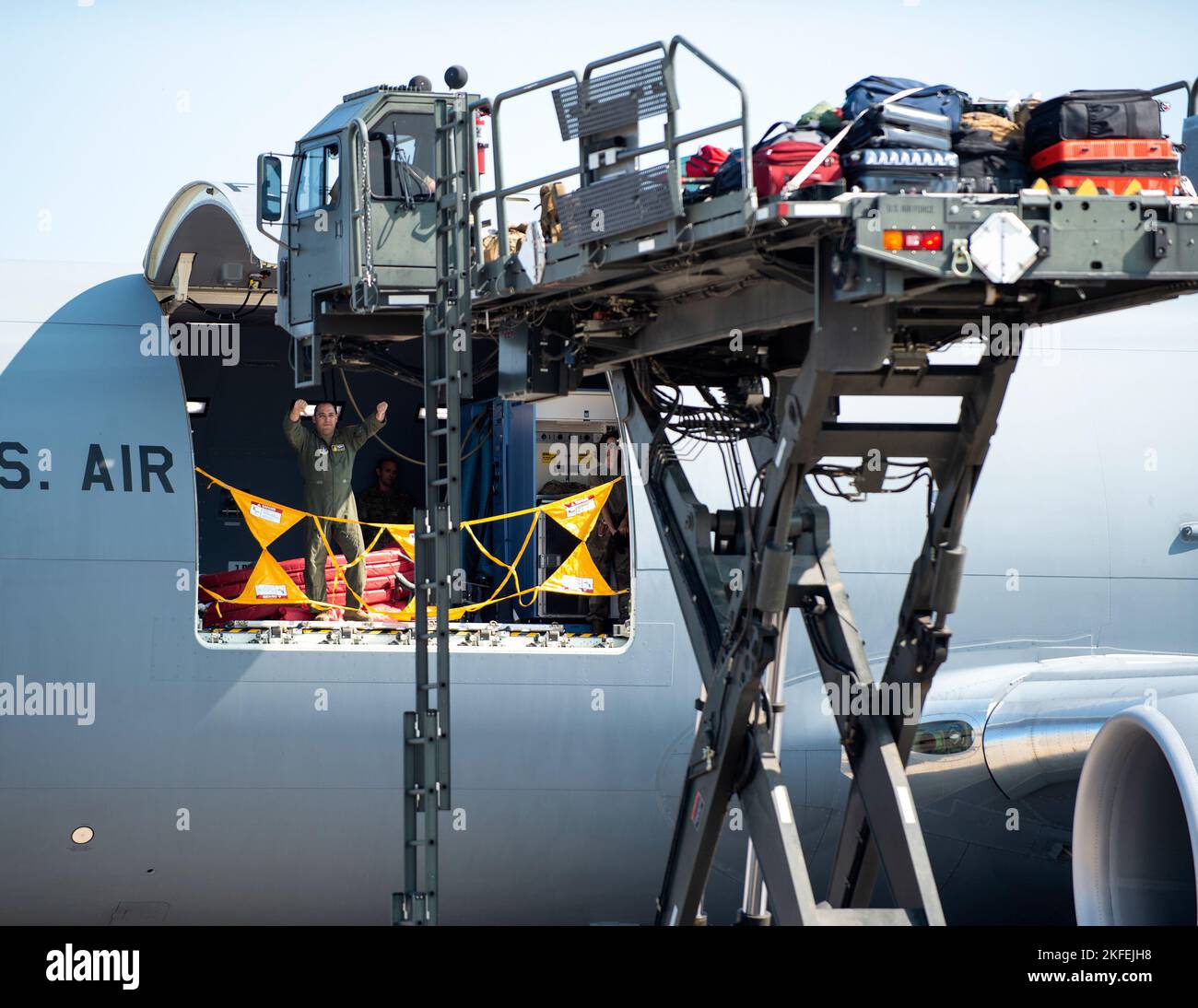 A U.S. Air Force Airman from the 133rd Air Refueling Squadron directs U ...