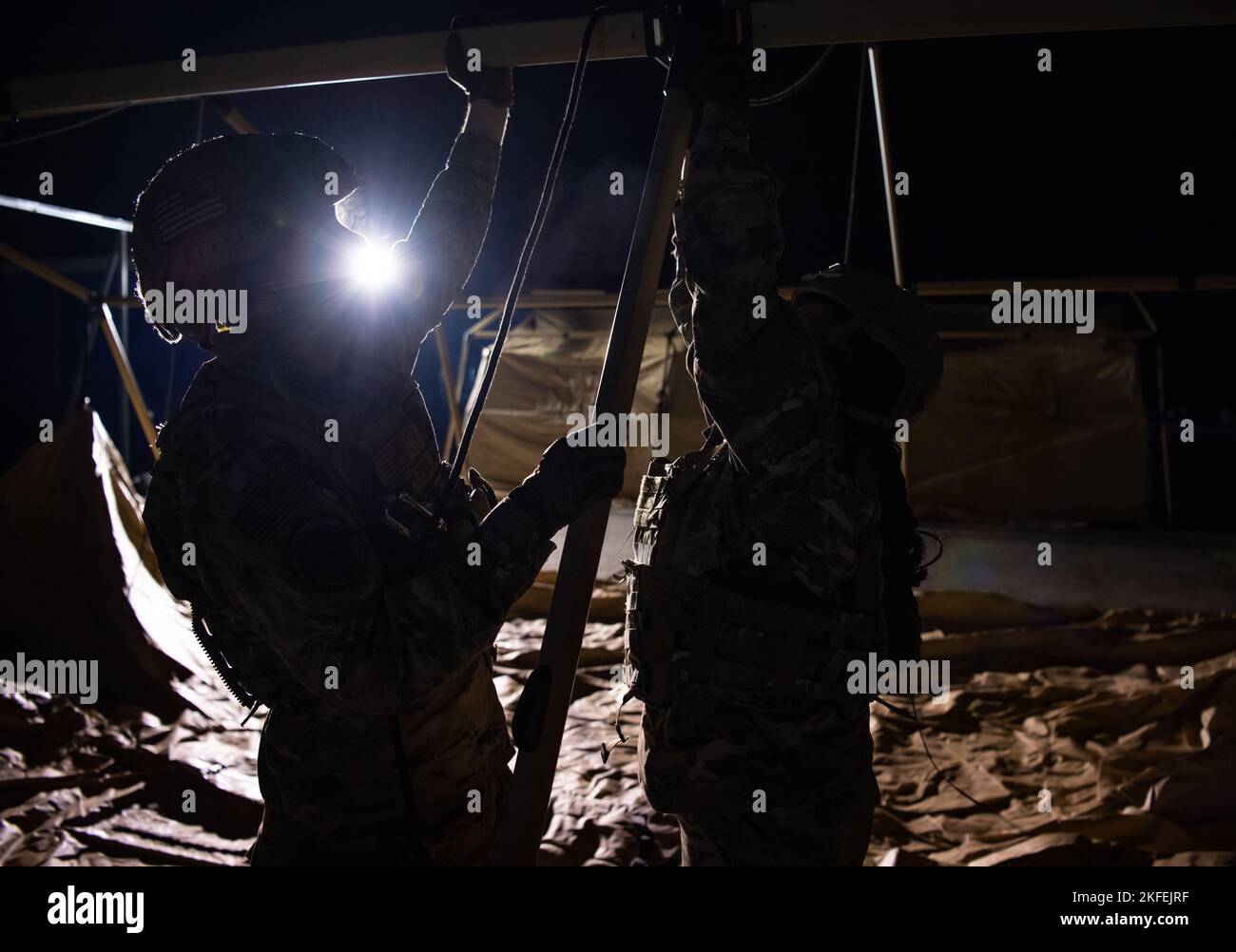 U.S. Air Force Senior Airman Andrew Pierson, left, 435th Contingency ...