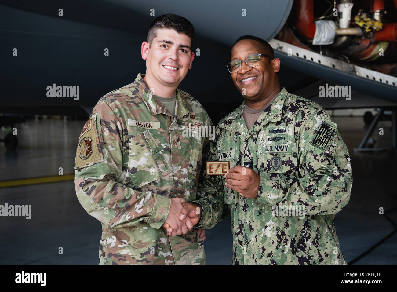 A U.S. Air Force Airman presents an electrical and environmental ...