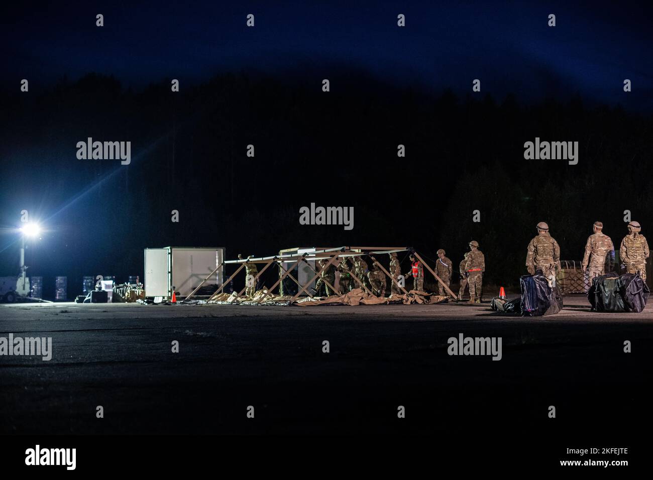 Airmen assigned to the 435th Contingency Response Group set up tents ...