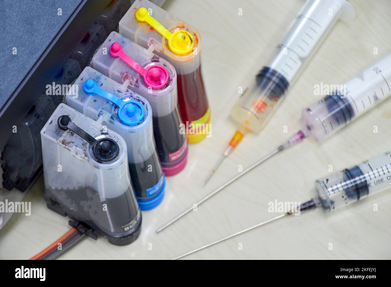 side view of the ink tank of the printer, there are 4 colors Stock ...