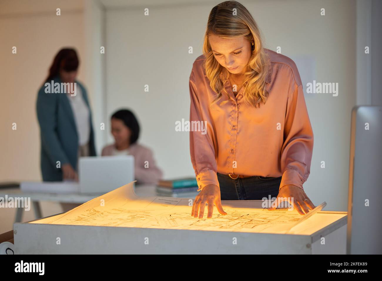 Architect, planning and woman with blueprint in office for design, idea ...