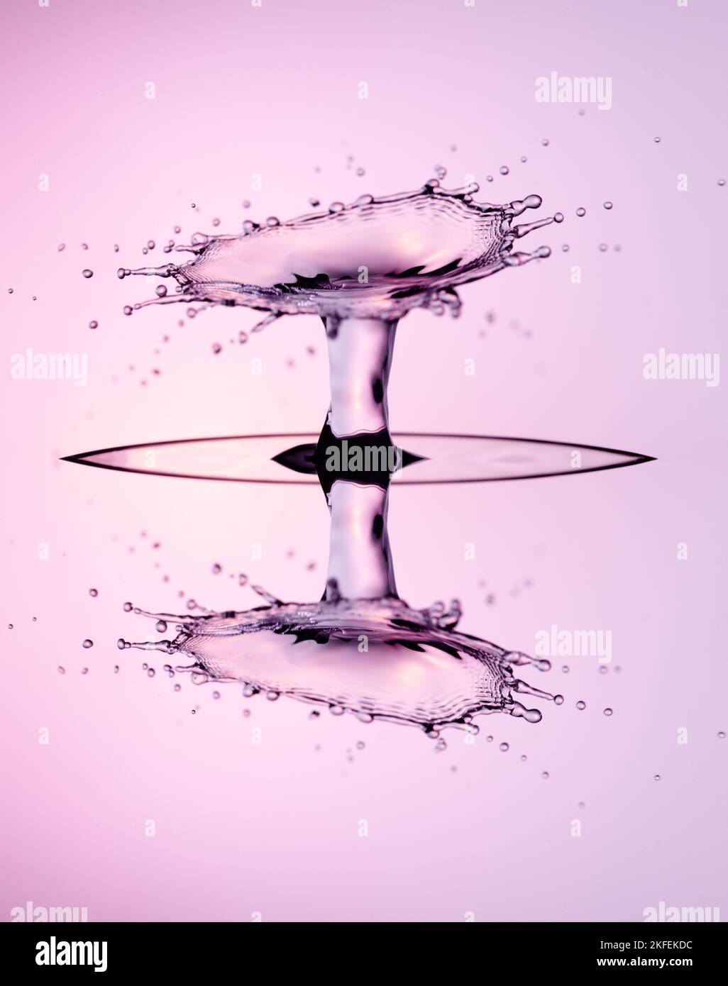 Water Drop with Ripples on water surface Stock Photo - Alamy
