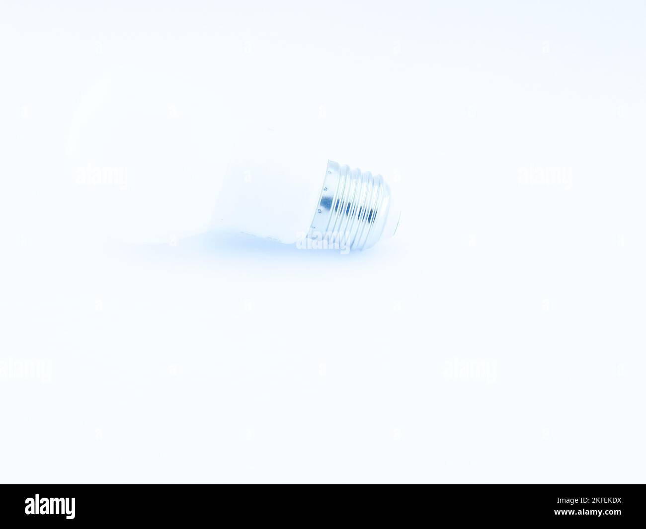 White light bulb. Very bright. On a white background, the concept is ...