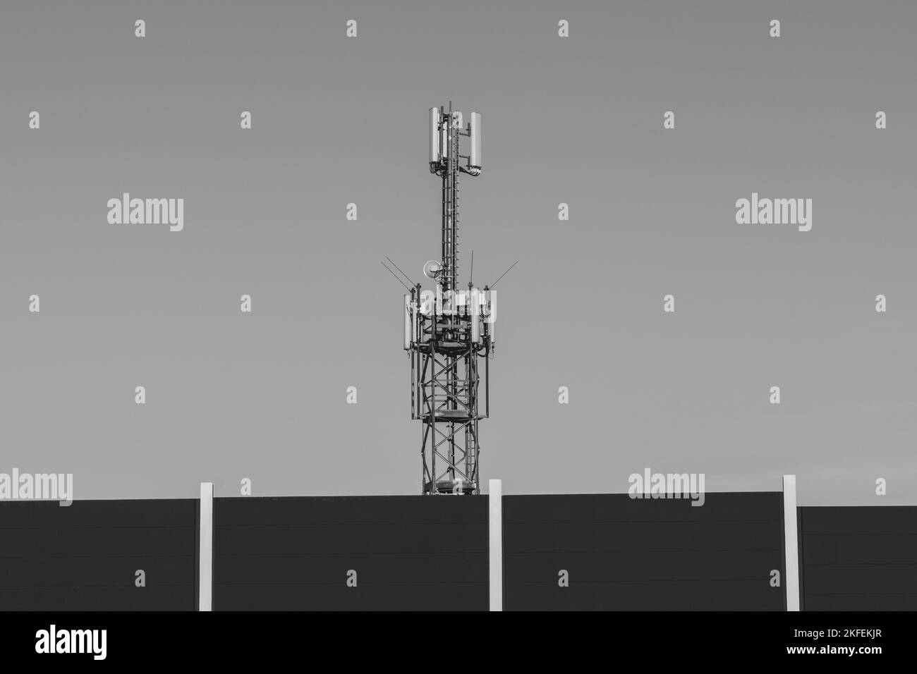 A grayscale shot of a tall transmission tower in Wetzlar, Germany Stock ...