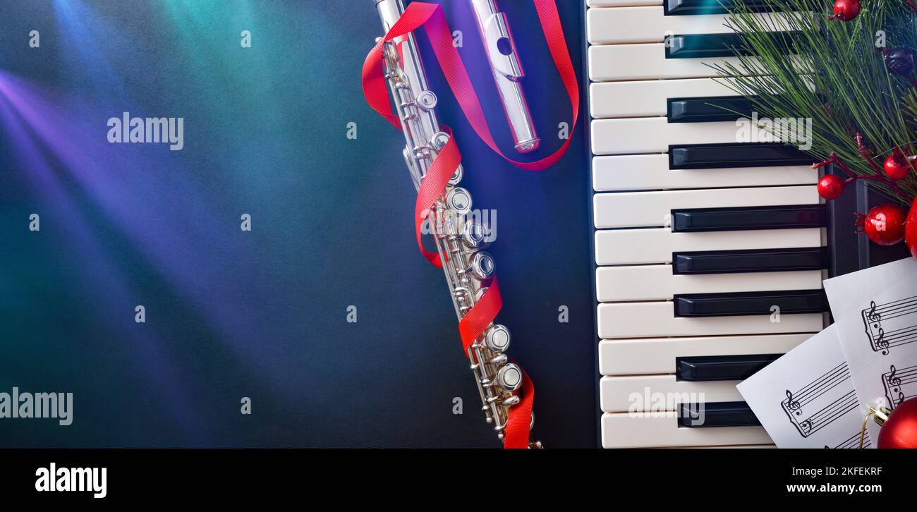 Piano and transverse flute Christmas concert concept with instruments ...