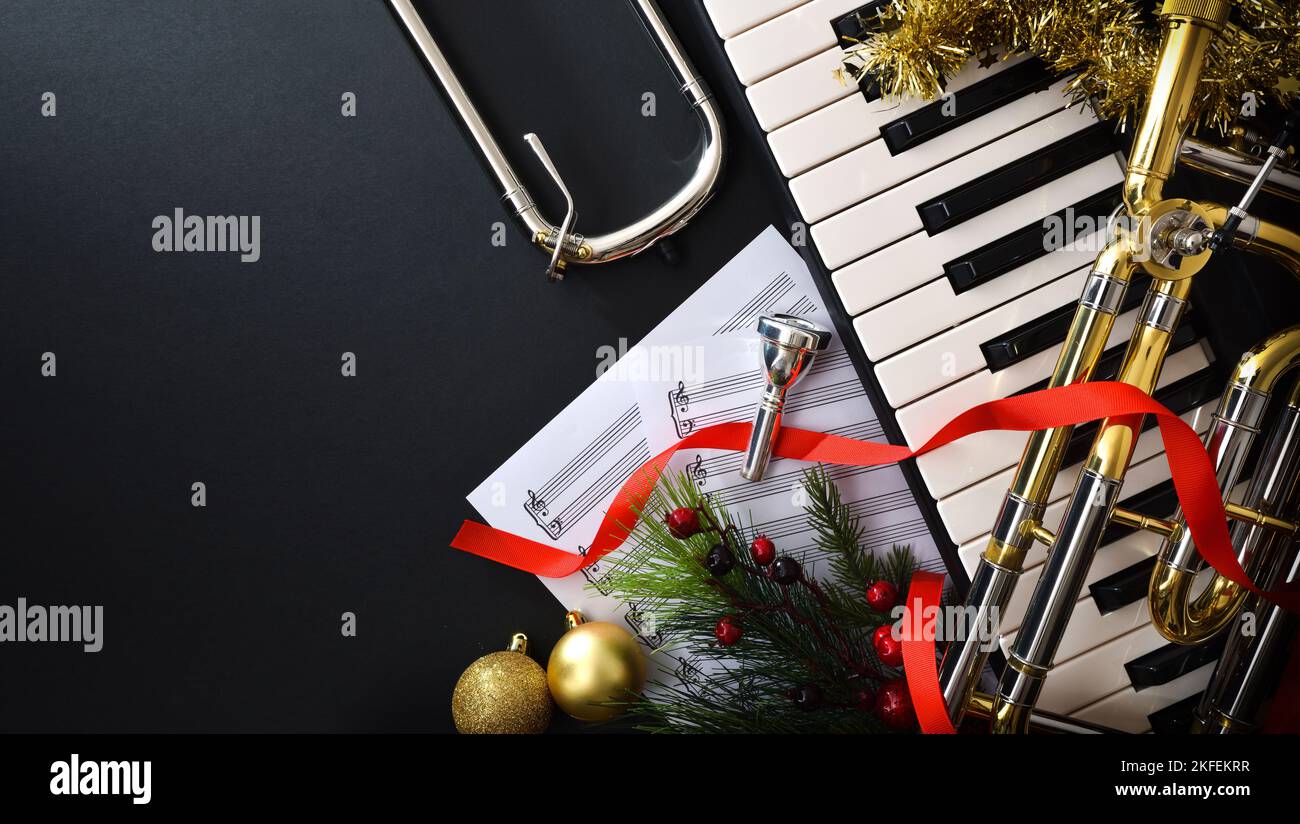 Christmas musical performance background with piano and trombone with ...