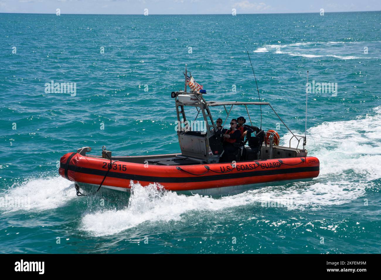 The Over The Horizon cutter boat crew rides alongside the USCGC Mohawk ...