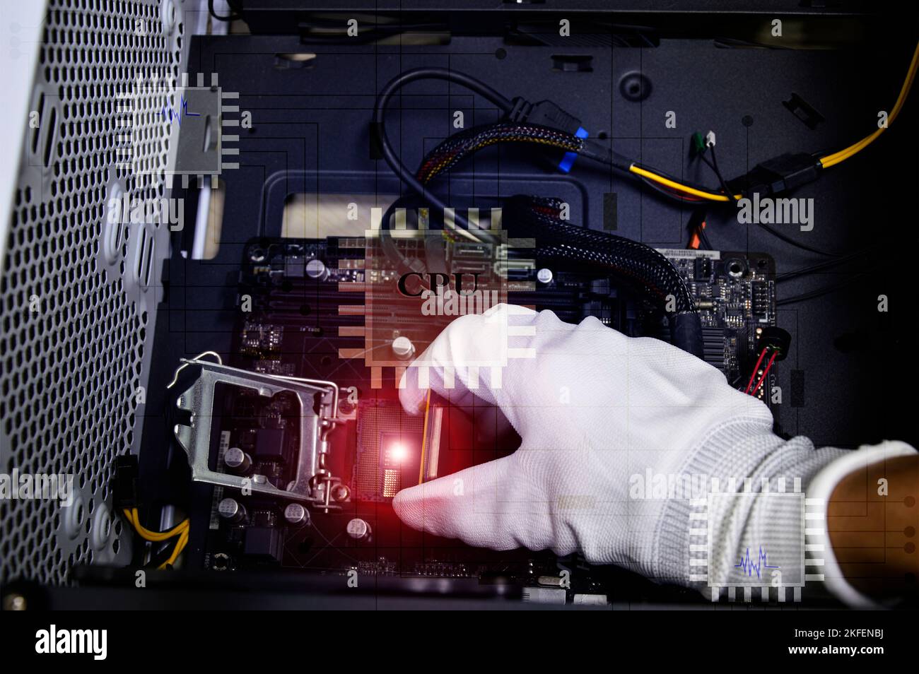 Image of a technician inserting a CPU chip onto a computer motherboard Stock Photo - Alamy