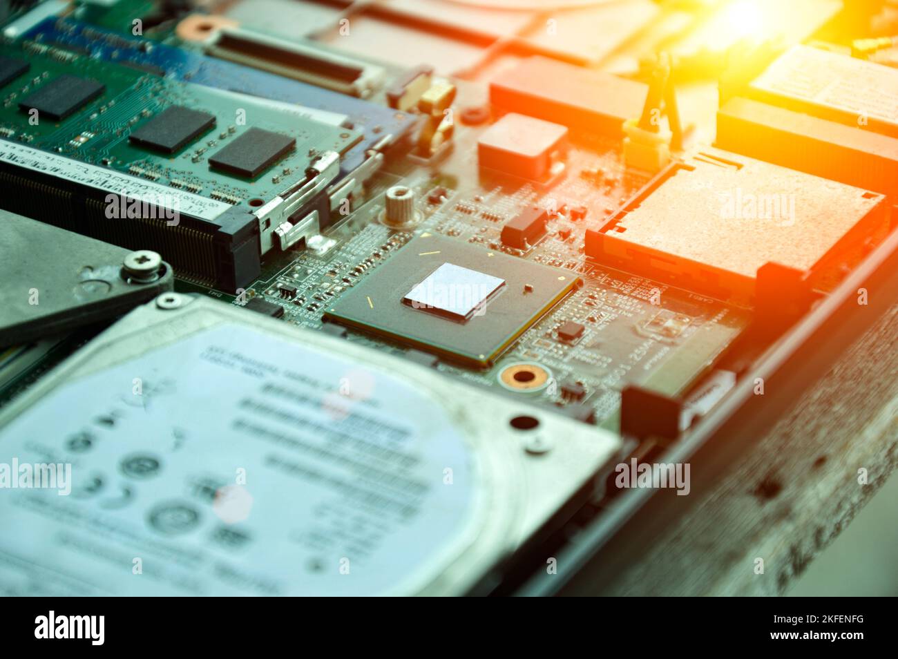 Close-up of a part of a computer motherboard, with many IC chips ...