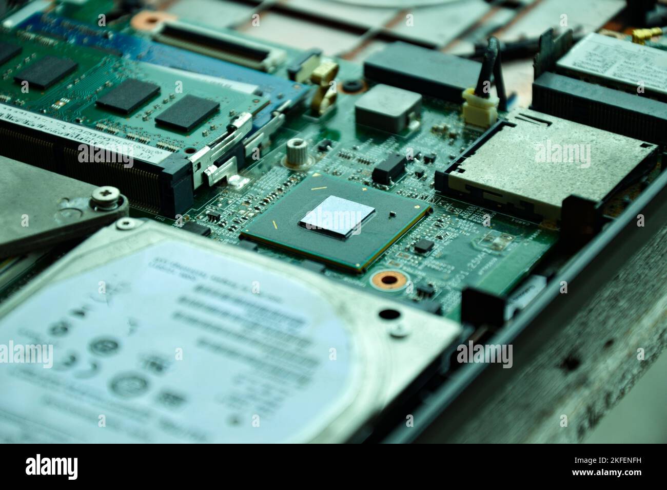 Close-up of a part of a computer motherboard, with many IC chips ...