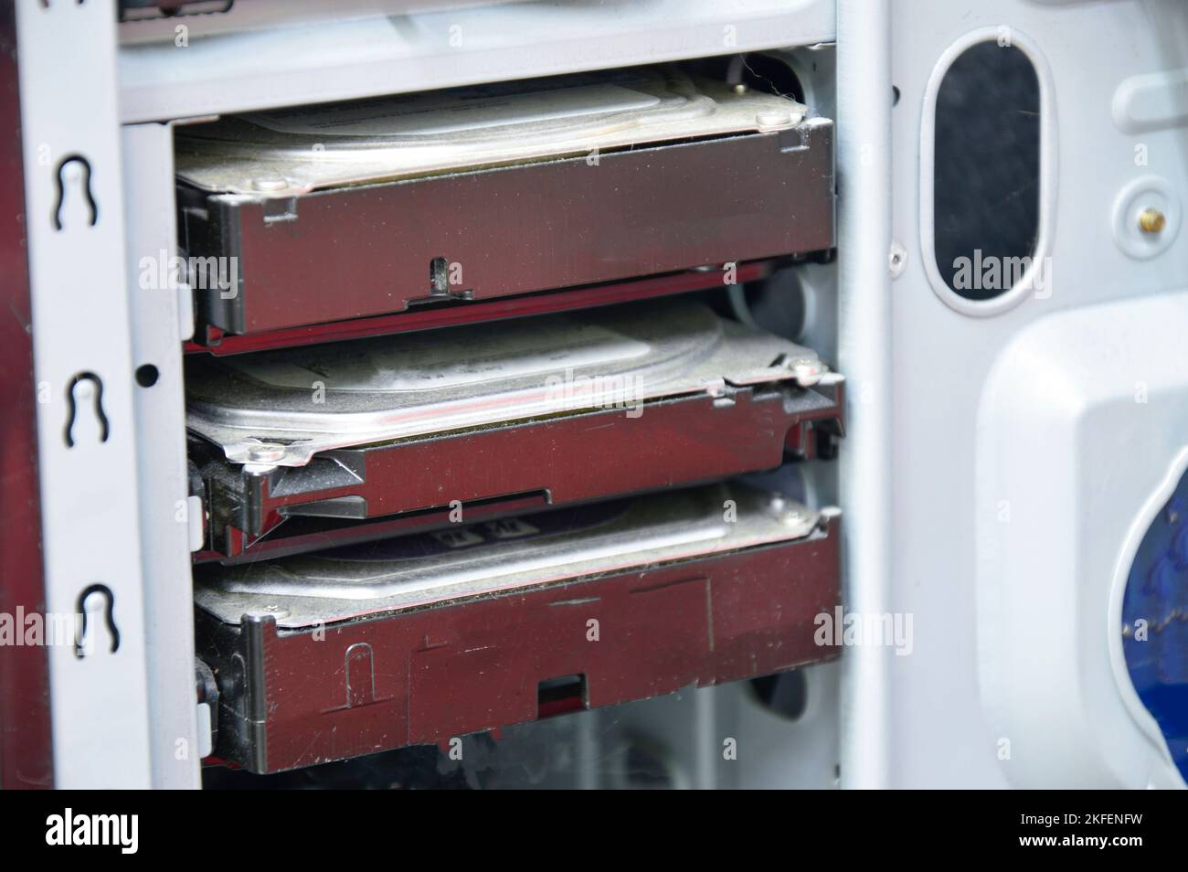 Side view of the 3 hard disks contained in the computer case. and a lot ...