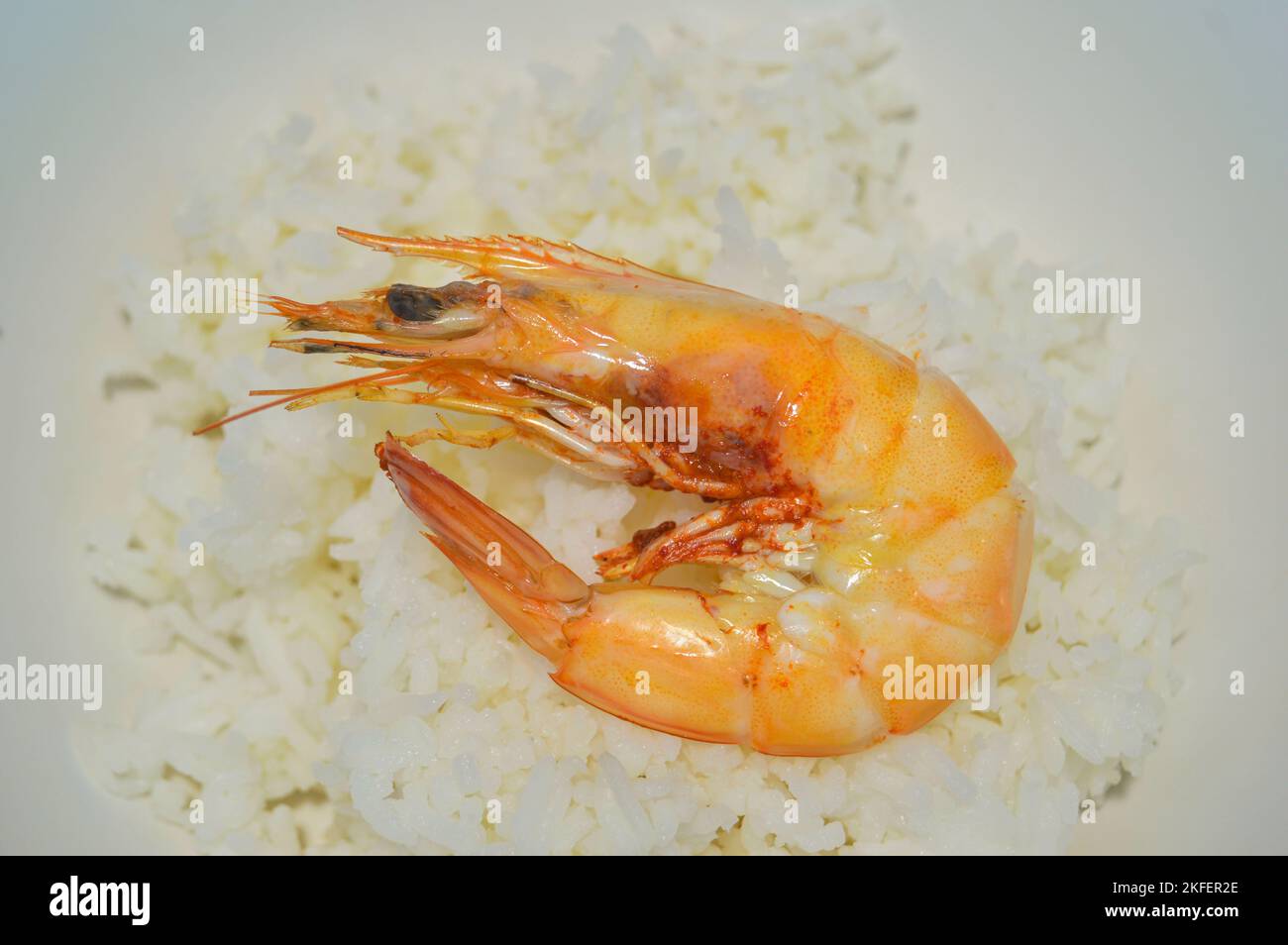Shrimp that has been cooked through the process of cooking its color is ...