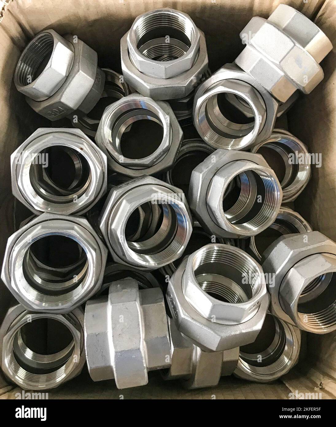 Silver inner threaded coupling, metal coupling Stock Photo - Alamy