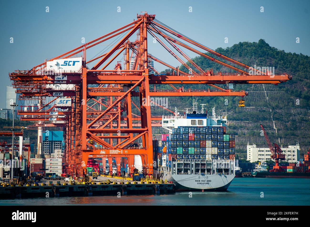 Container ships shuttle over the sea at the Guangdong-Hong Kong-Macao ...