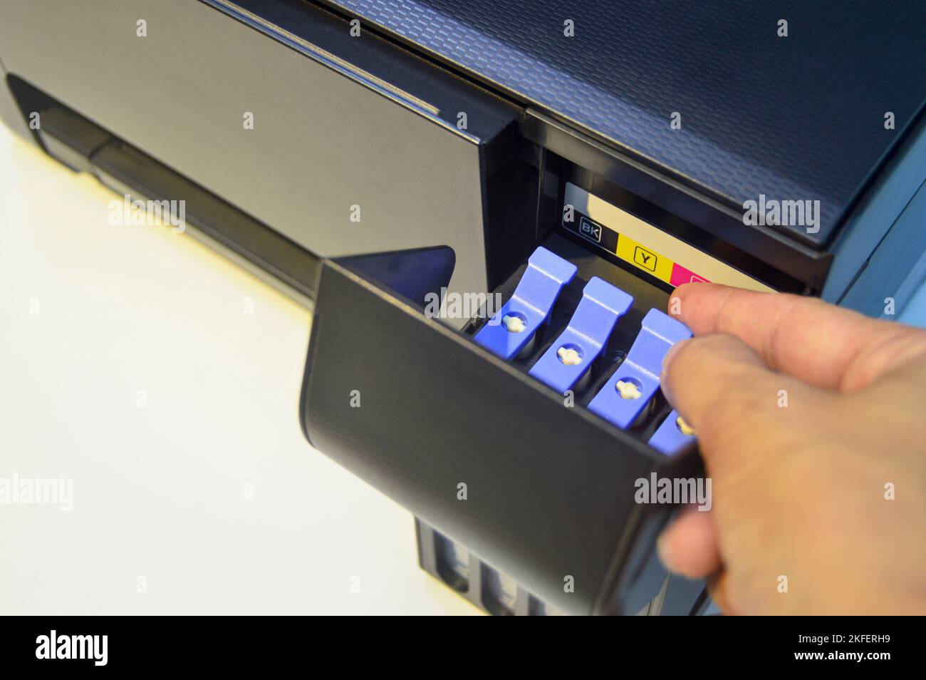 Printers refill ink tank type are very popular nowadays Stock Photo - Alamy