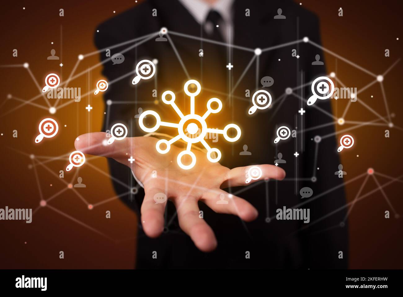 Hand holding social media icons Stock Photo - Alamy