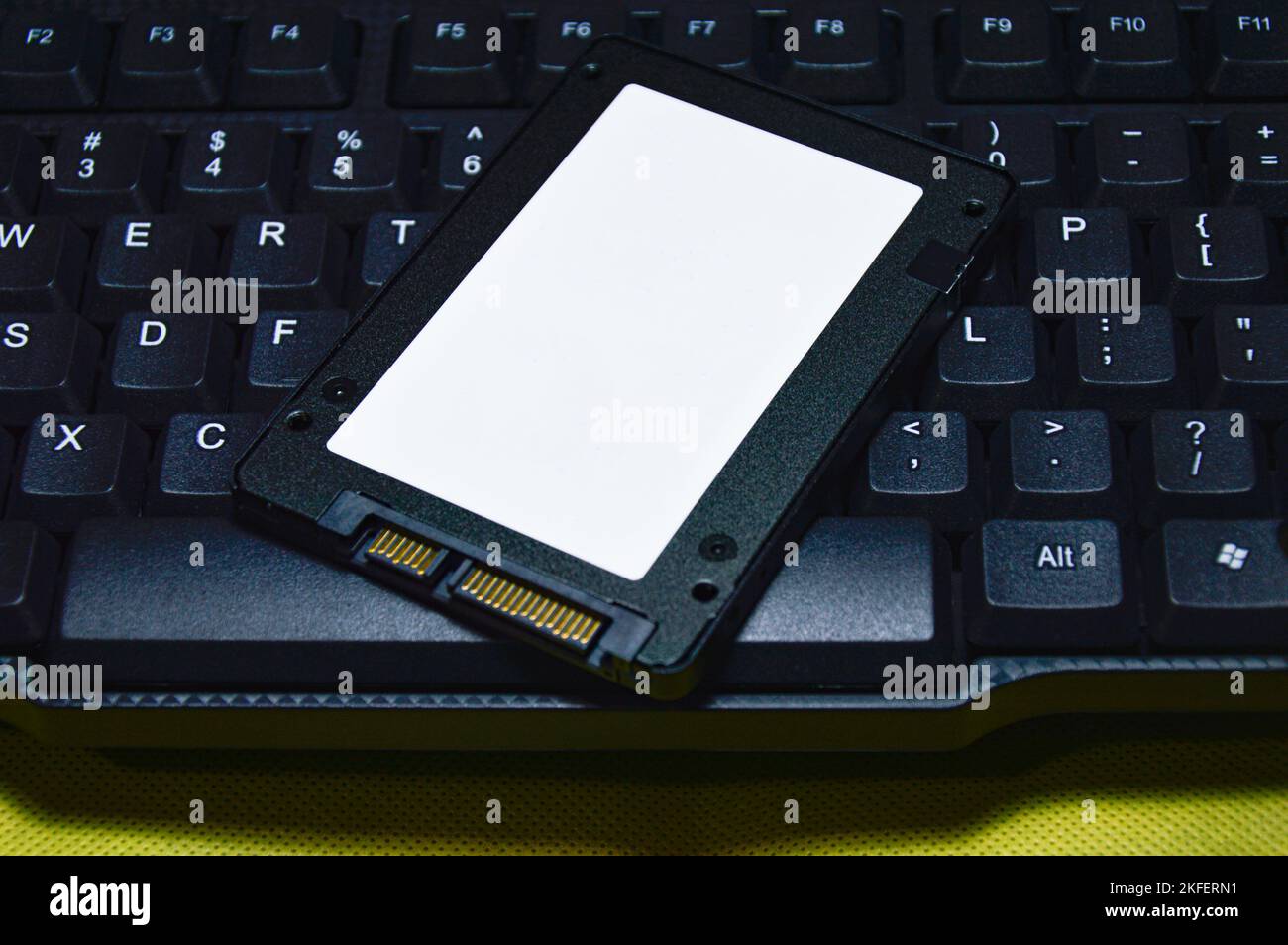 2.5-inch SSD hard drive placed on the keyboard Stock Photo - Alamy
