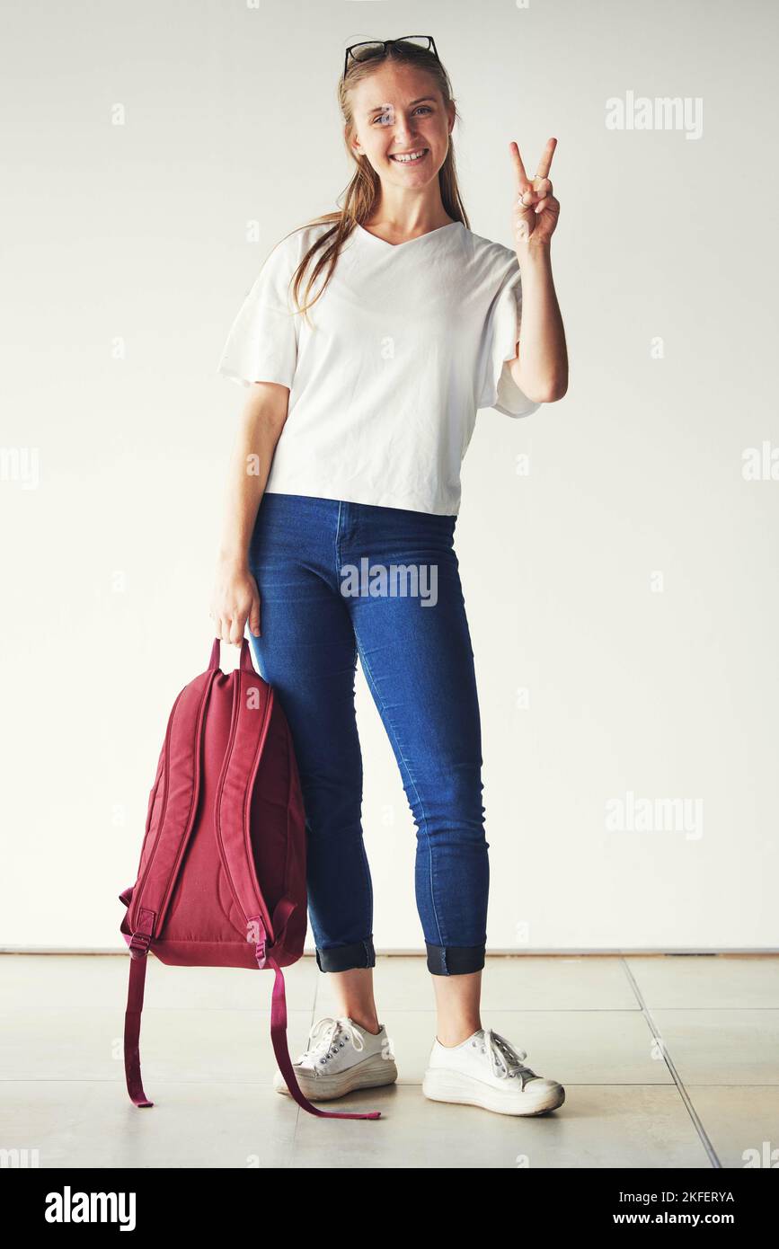 Woman, student and backpack with peace sign in portrait before college ...