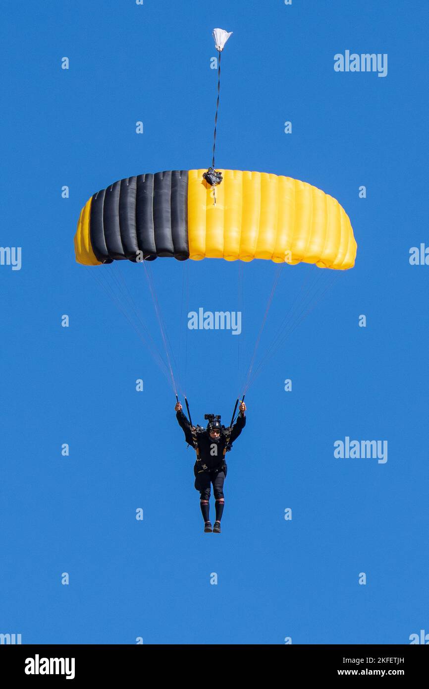 Sgt. 1st Class Jonathan Lopez of the U.S. Army Parachute Team lands his ...