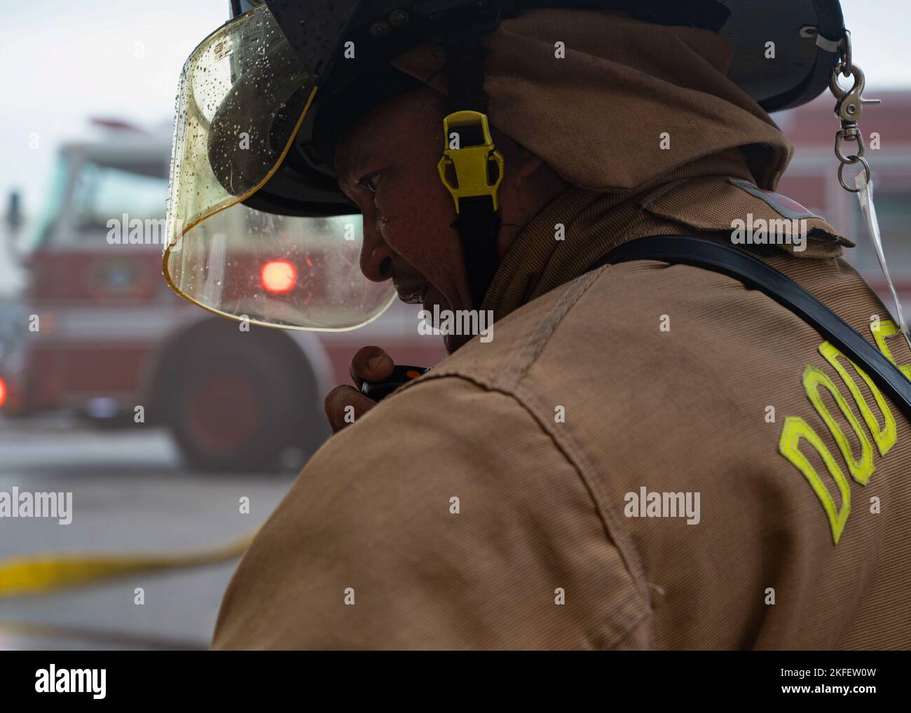 A U.S. Air Force firefighter assigned to the 36th Civil Engineer ...